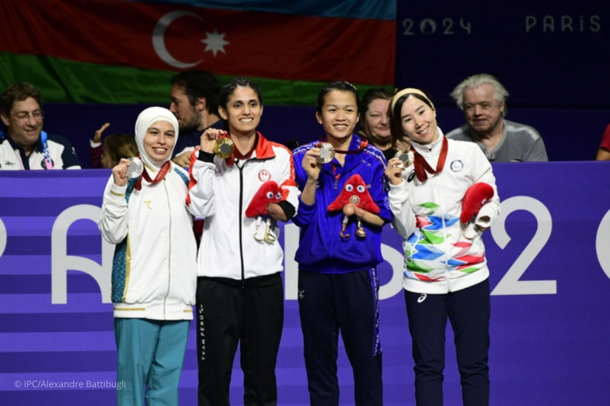 Largest-ever Refugee Olympic Team makes its entrance as Paris Games open