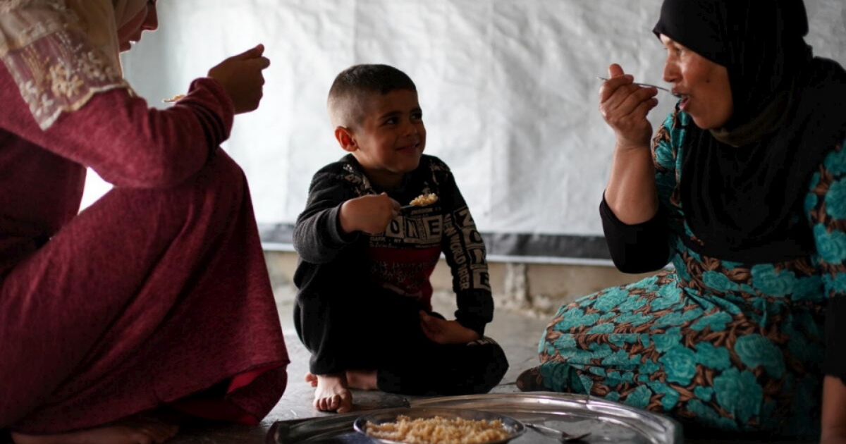 Twelve years on, Syrian refugees face deepening debt and hunger
